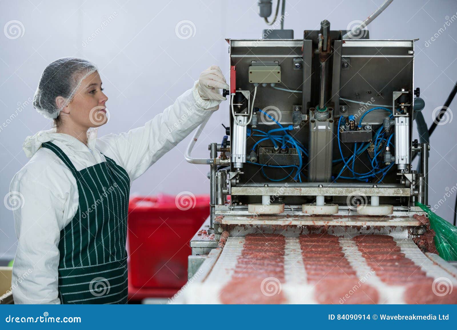 Female Butcher Processing Hamburger Patty Stock Photo - Image of ...