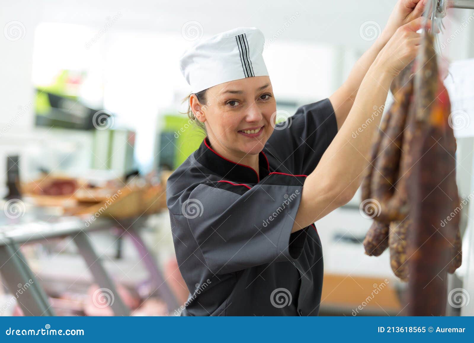 Female Butcher Processing Sausages at Meat Factory Stock Image - Image ...