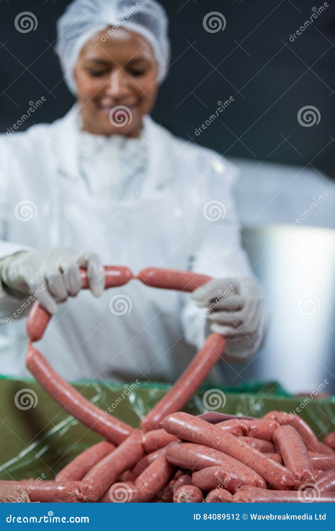 Female Butcher Processing Sausages Stock Photo - Image of butchers ...