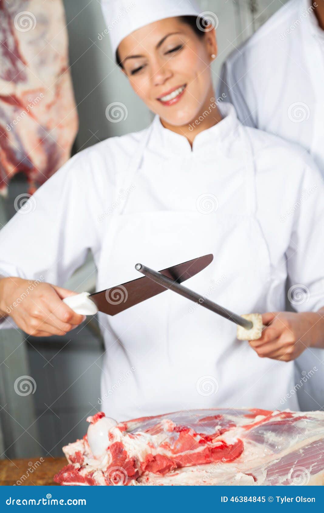 Female Butcher Sharpening Knife Stock Image - Image of butcher, girl ...