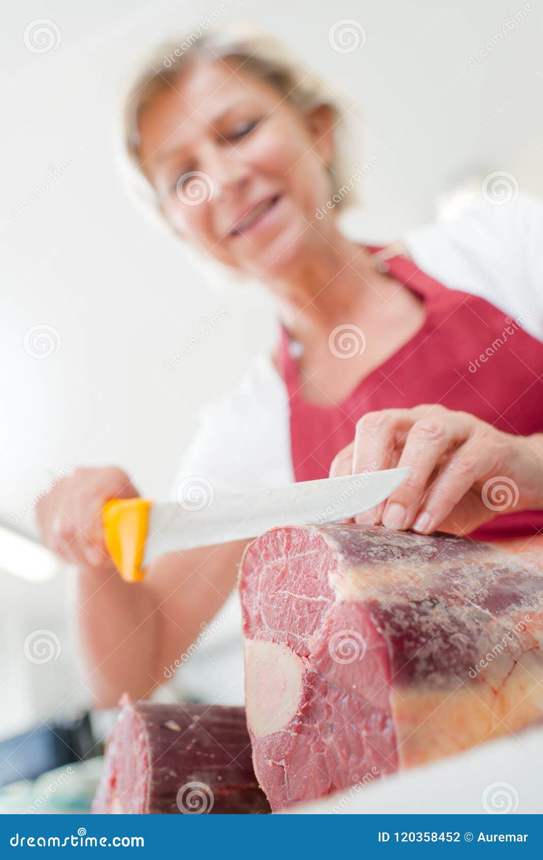Female Butcher Slicing Beef Stock Photo - Image of shop, meat: 120358452