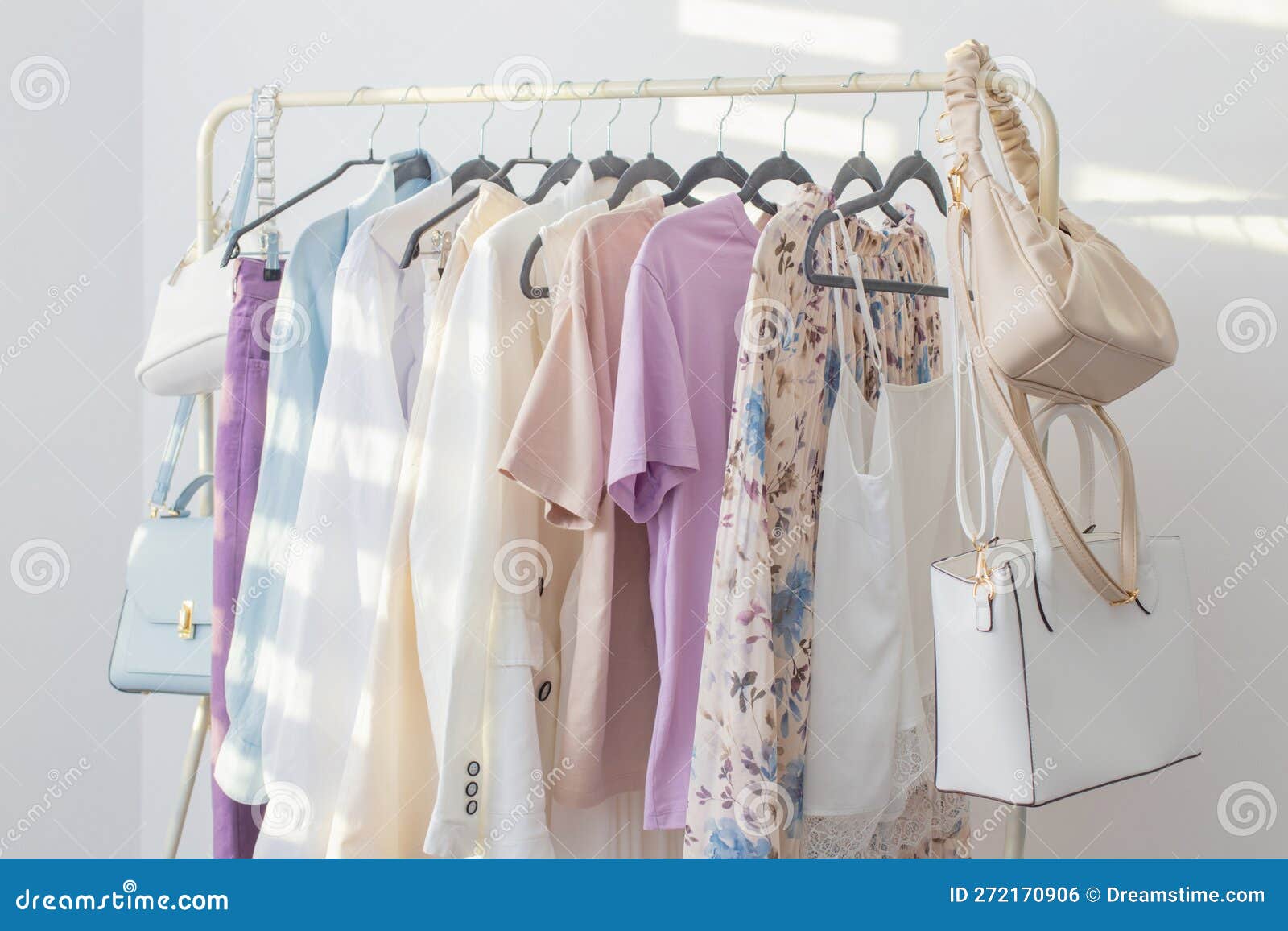 Female Capsule Summer Wardrobe in White Room Stock Photo - Image of ...
