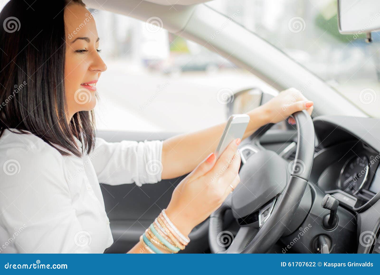 Female in Car Looking at Her Smart Phone Stock Photo - Image of chat ...