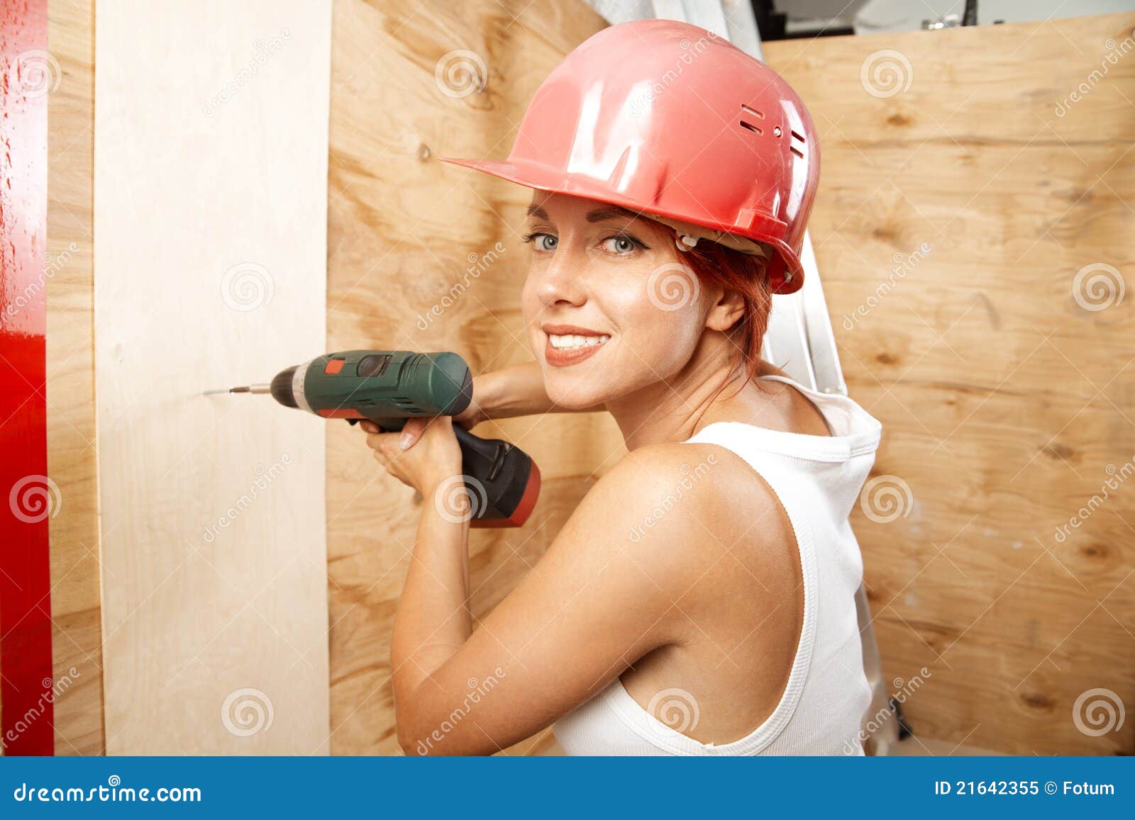 Female carpenter on duty stock image. Image of smiling - 21642355