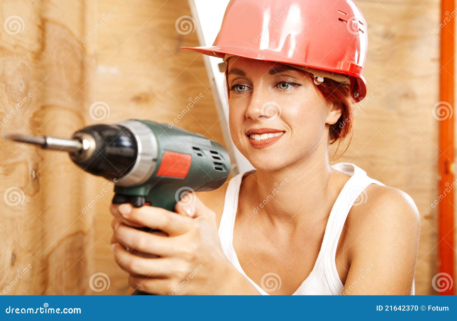 Female carpenter on duty stock photo. Image of smiling - 21642370
