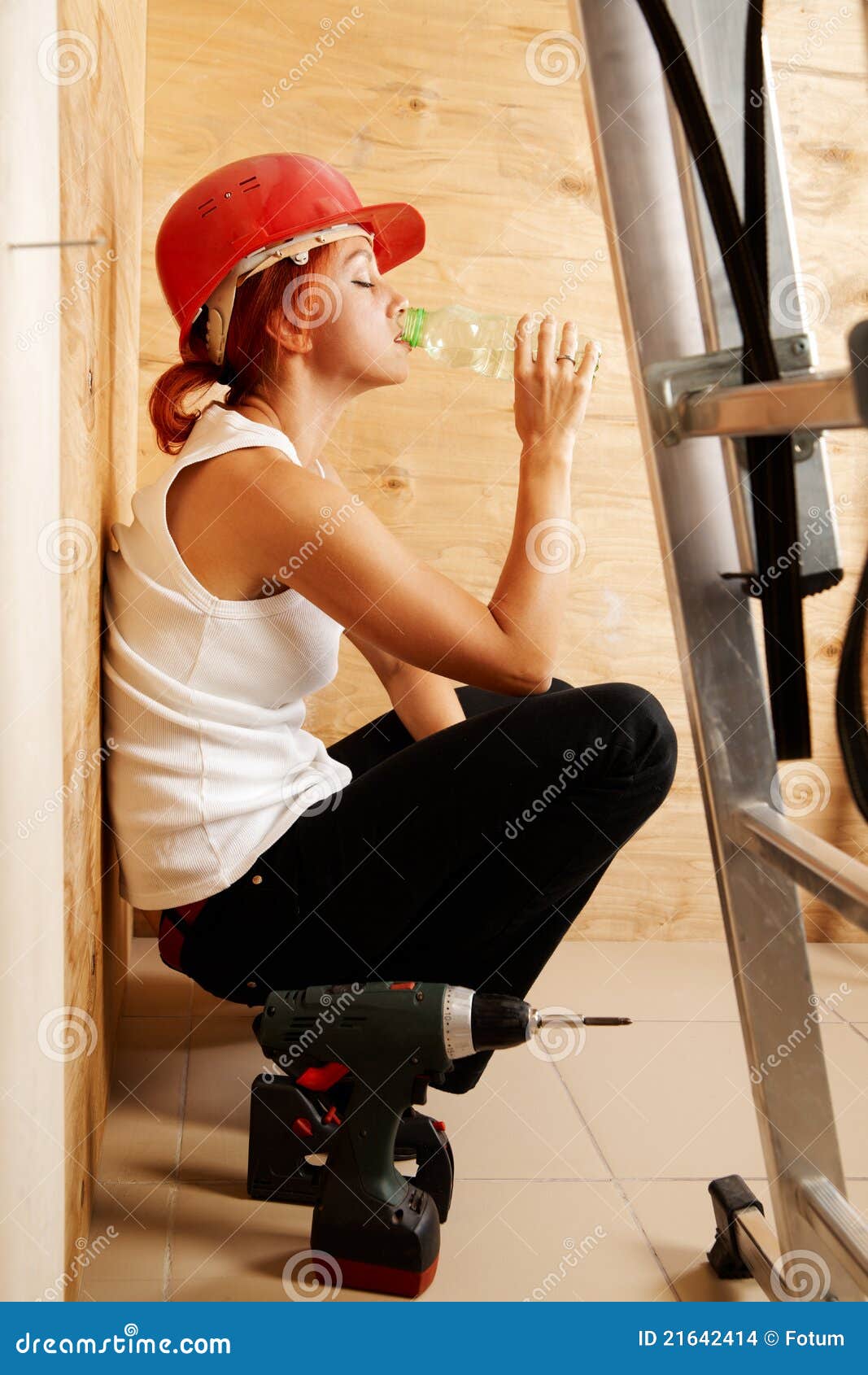 Female carpenter on duty stock photo. Image of holding - 21642414