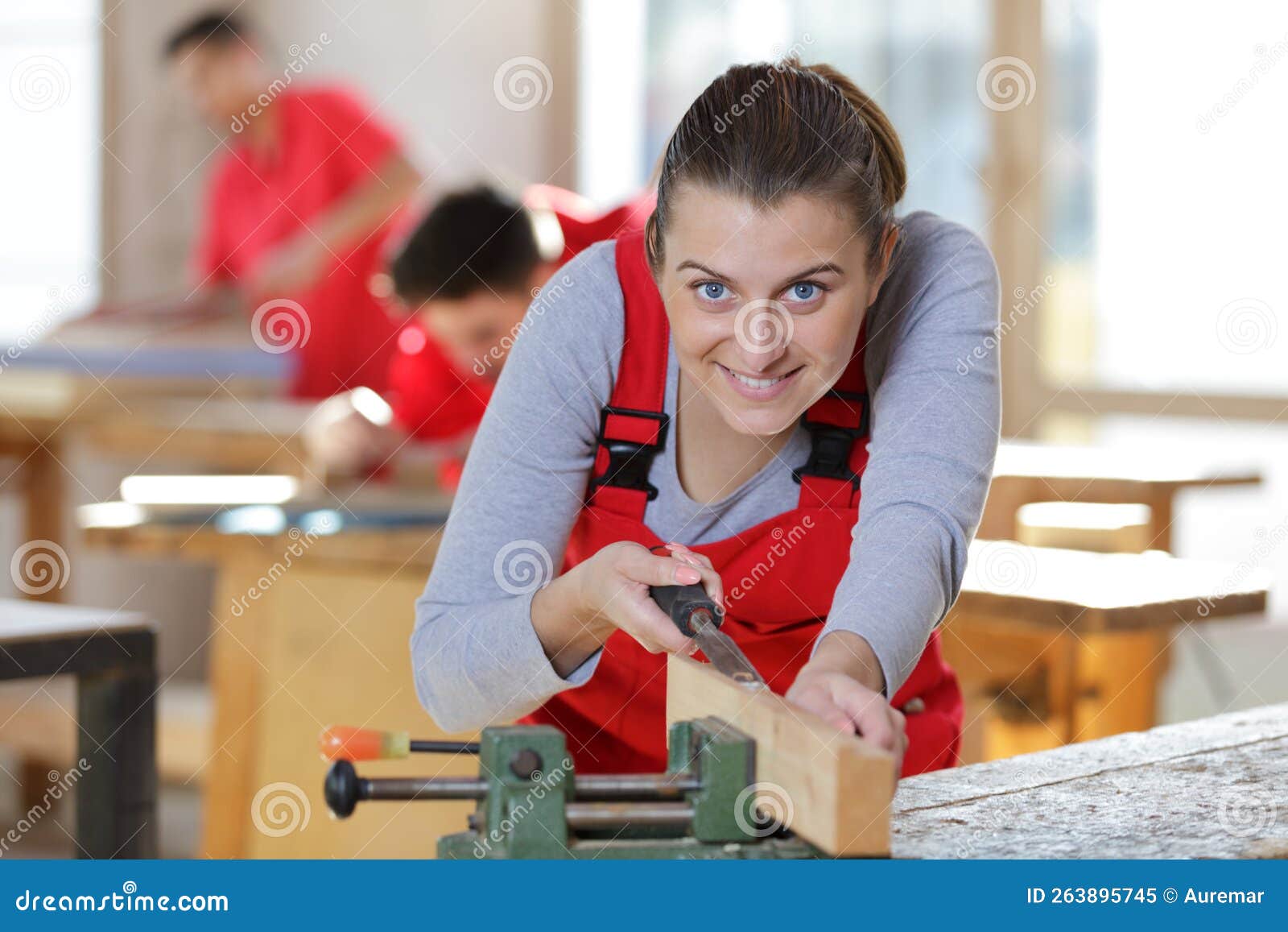 Female Carpenter in Workshop with Chisel in Hands Stock Image - Image ...
