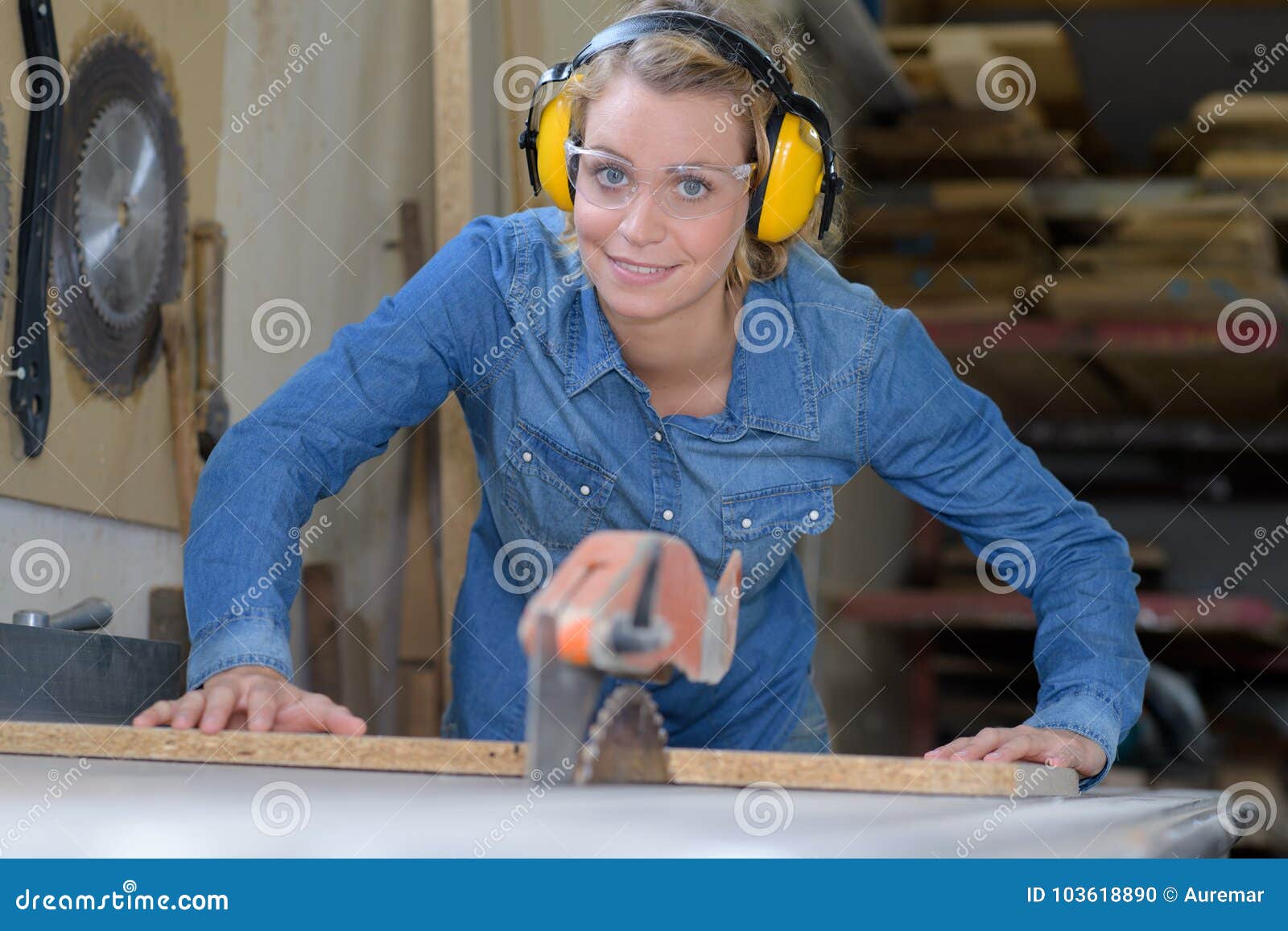 Female Carpenter in Workshop Stock Photo - Image of lifestyle, earmuffs ...