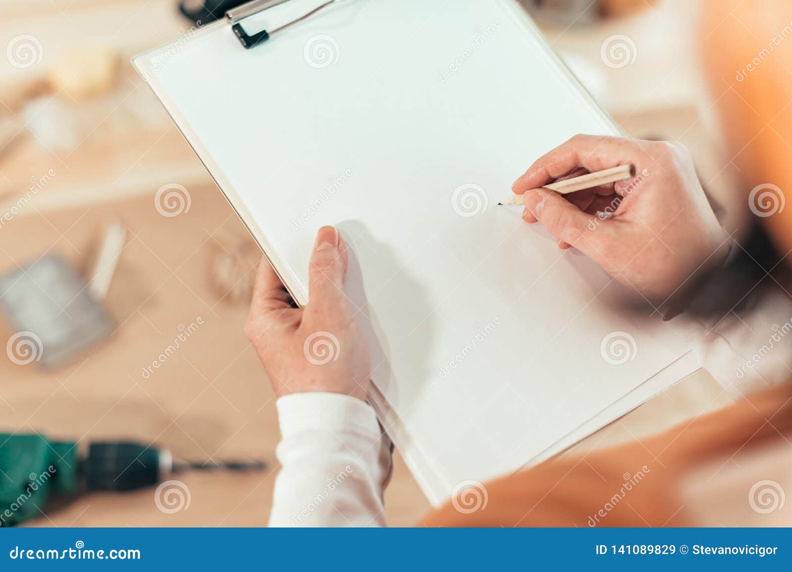 Female Carpenter Writing DIY Project Notes Stock Image - Image of mock ...