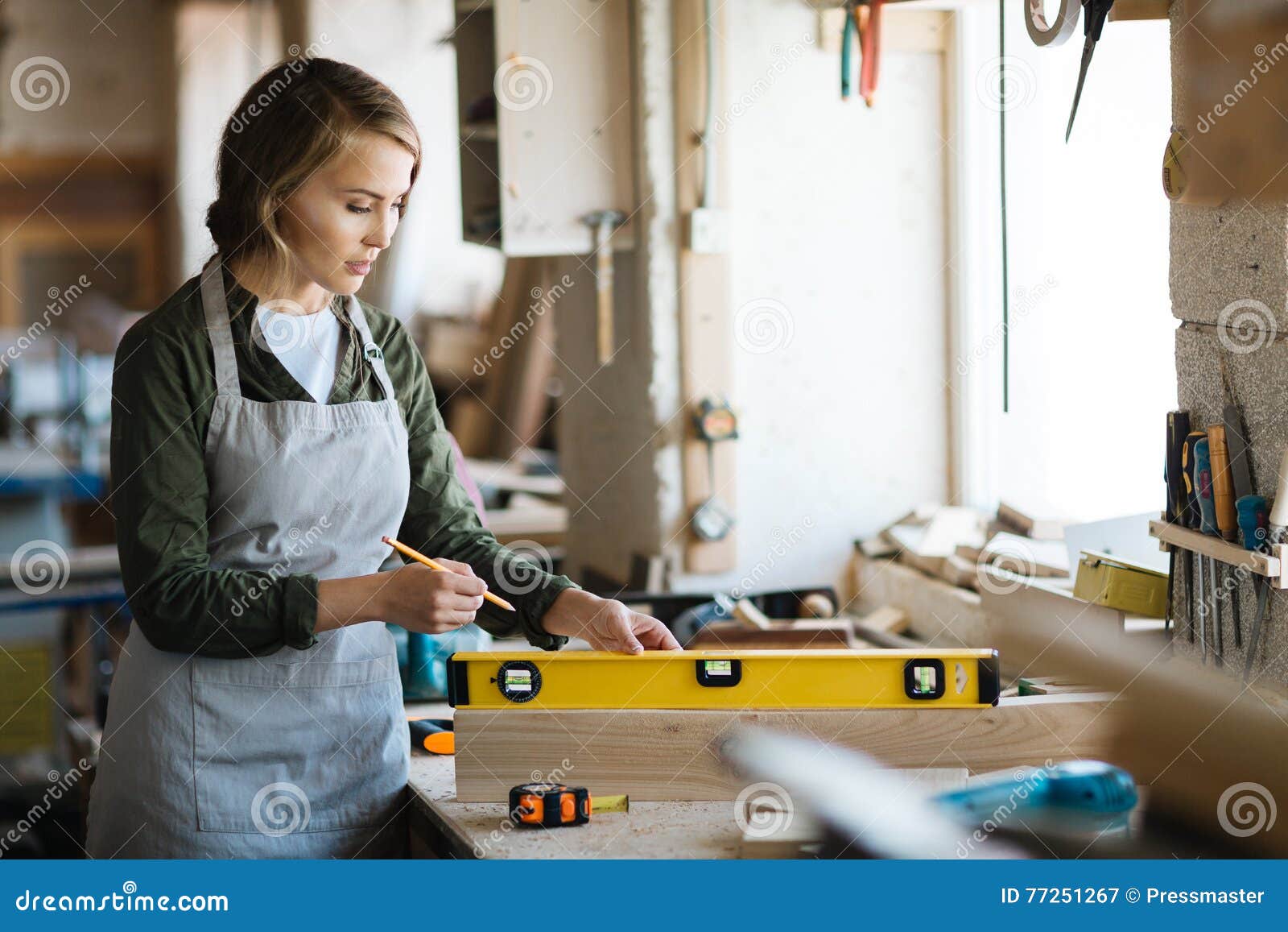 Female carpenter stock image. Image of level, workshop - 77251267