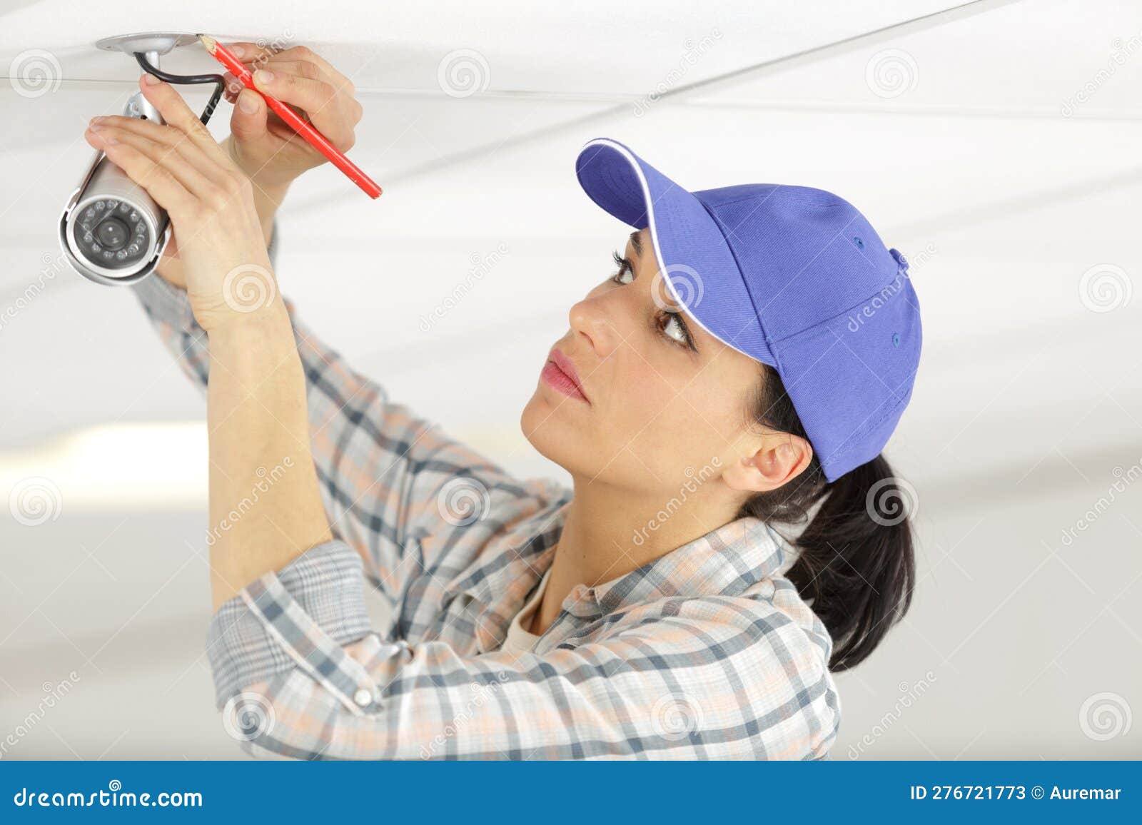 Female Cctv Installer Checking Security Camera Stock Image - Image of ...
