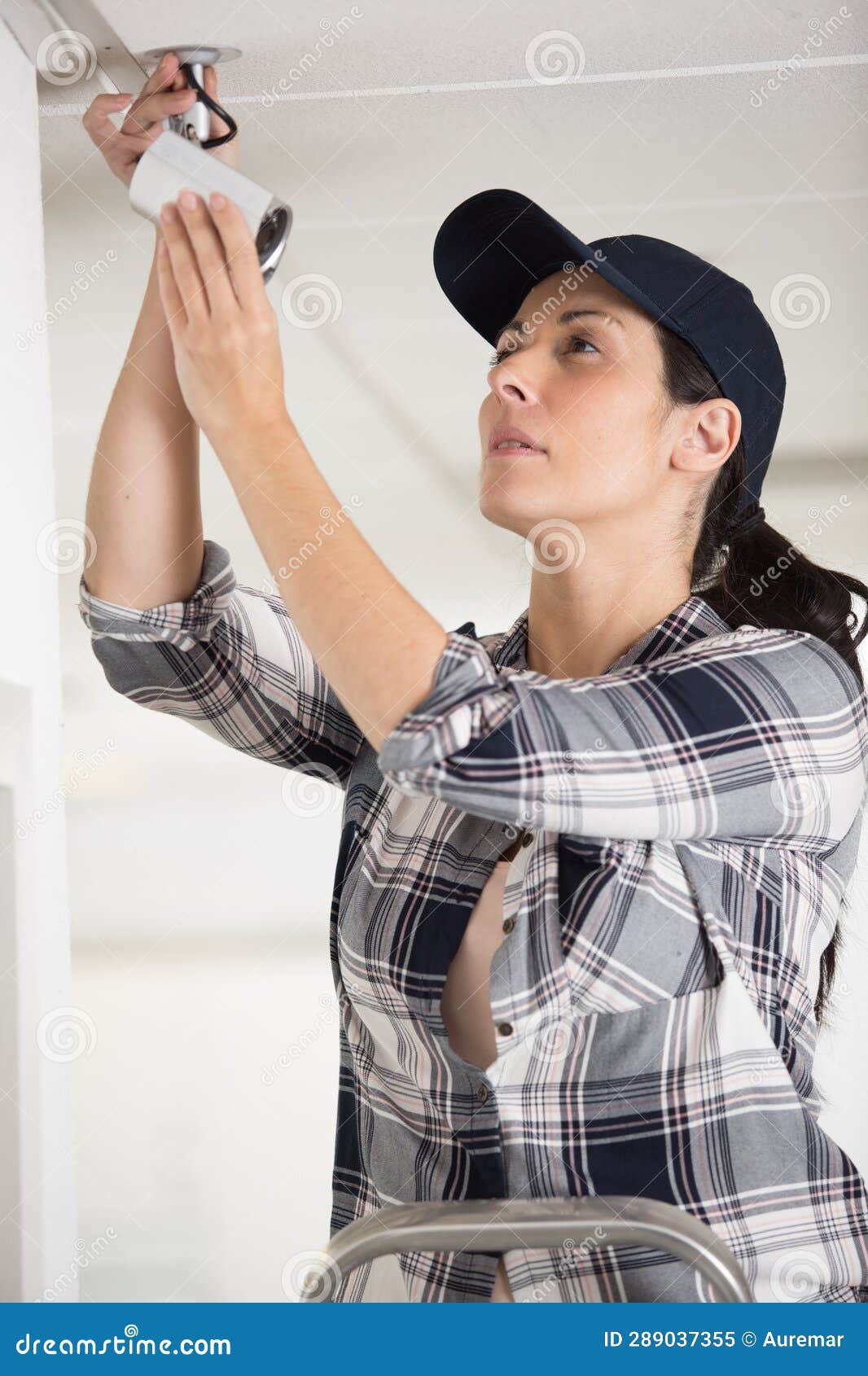 Female Cctv Installer Checking Security Camera Stock Image - Image of ...