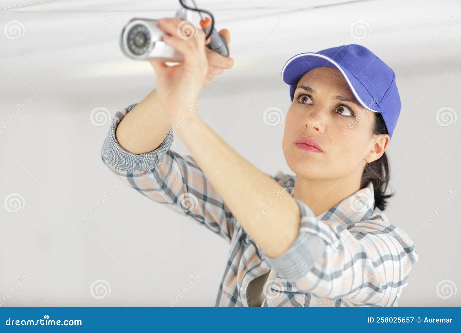 Female Cctv Installer Checking Security Camera Stock Image - Image of ...