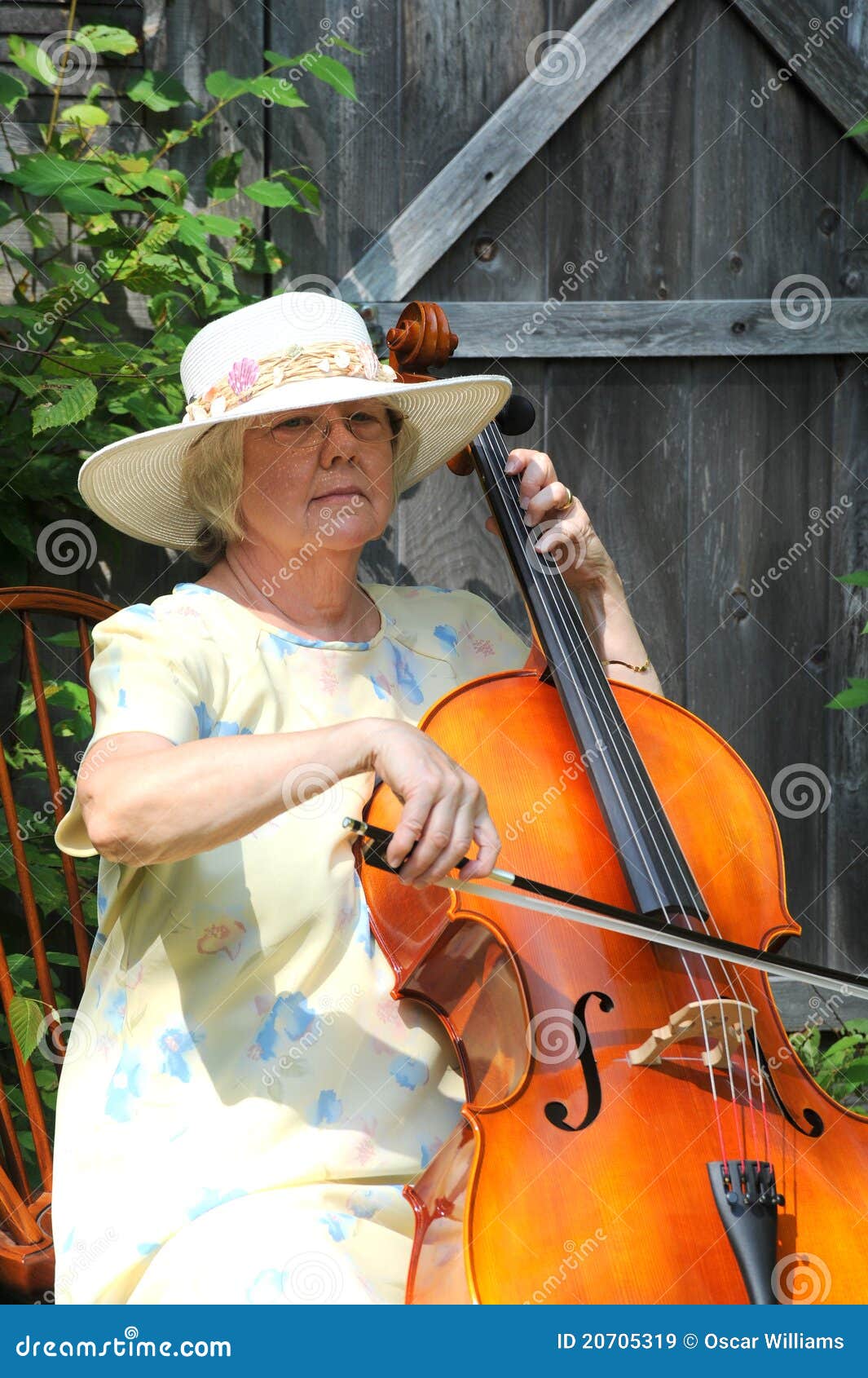 Female cellist. stock image. Image of music, instrument - 20705319