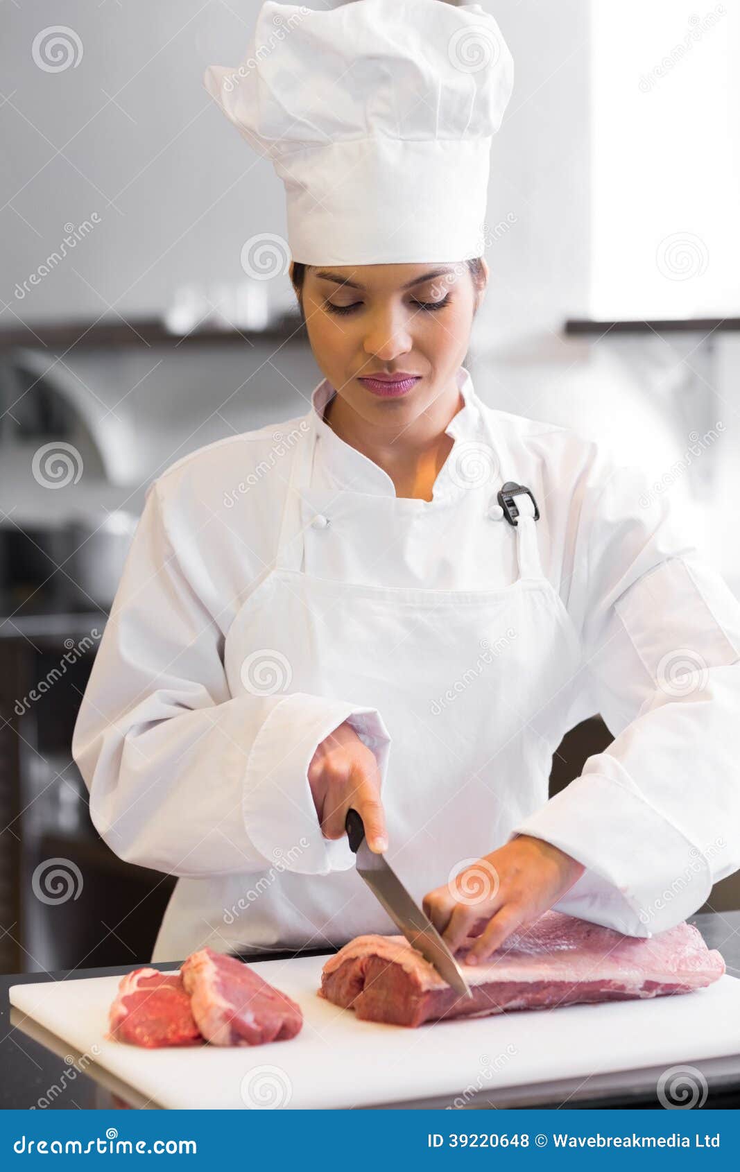Female Chef Cutting Meat in Kitchen Stock Photo - Image of board ...