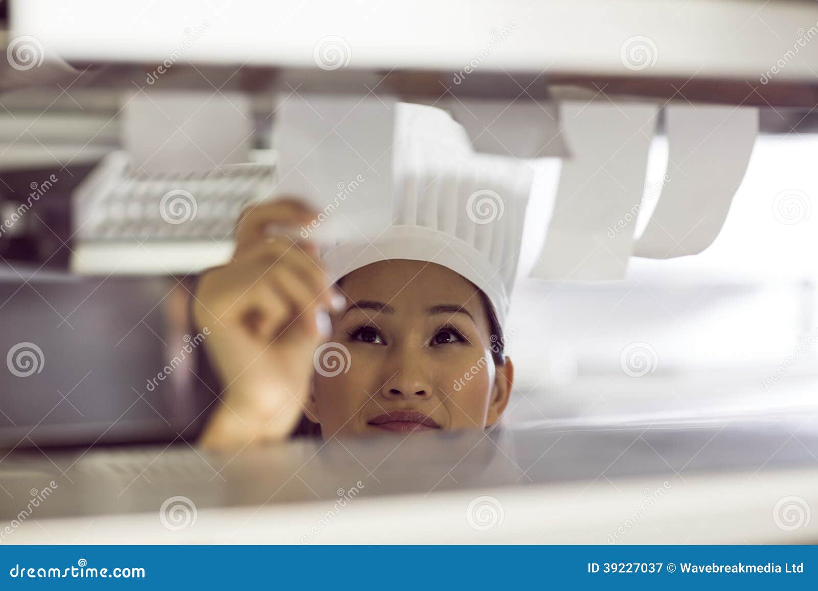 Female Chef Going through Cooking Checklist at Kitchen Stock Image ...