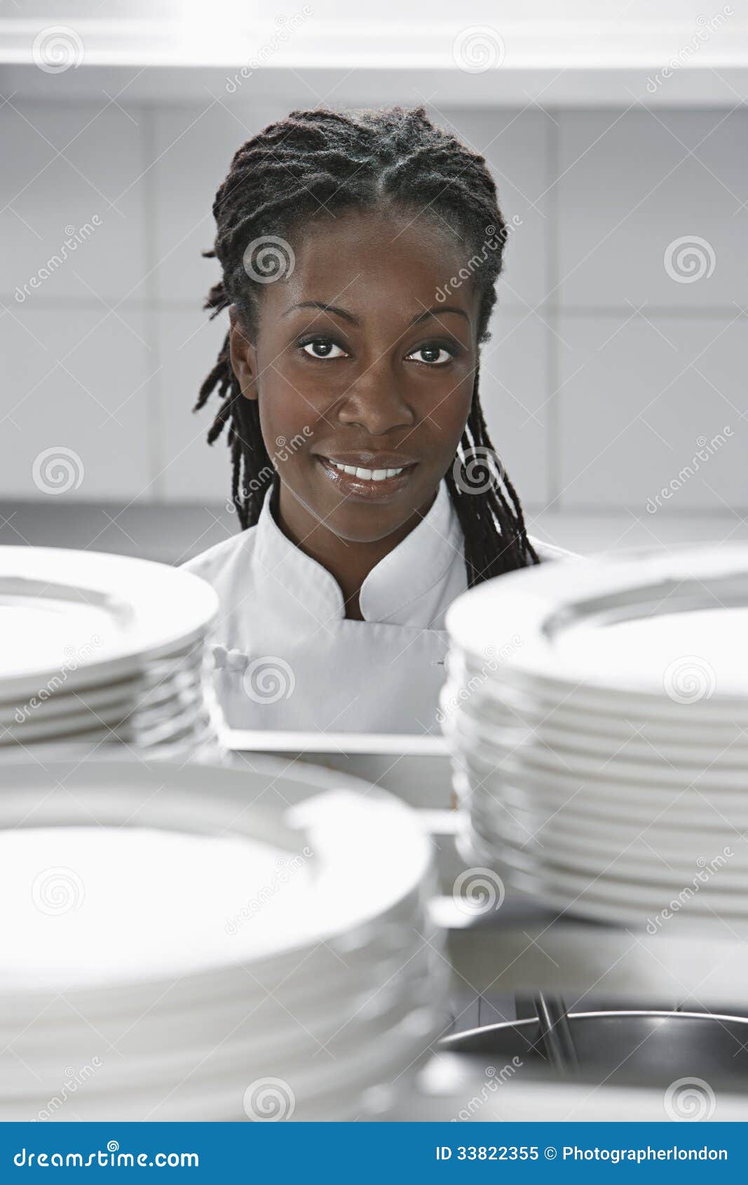 Female Chef in Kitchen stock image. Image of dreadlocks - 33822355