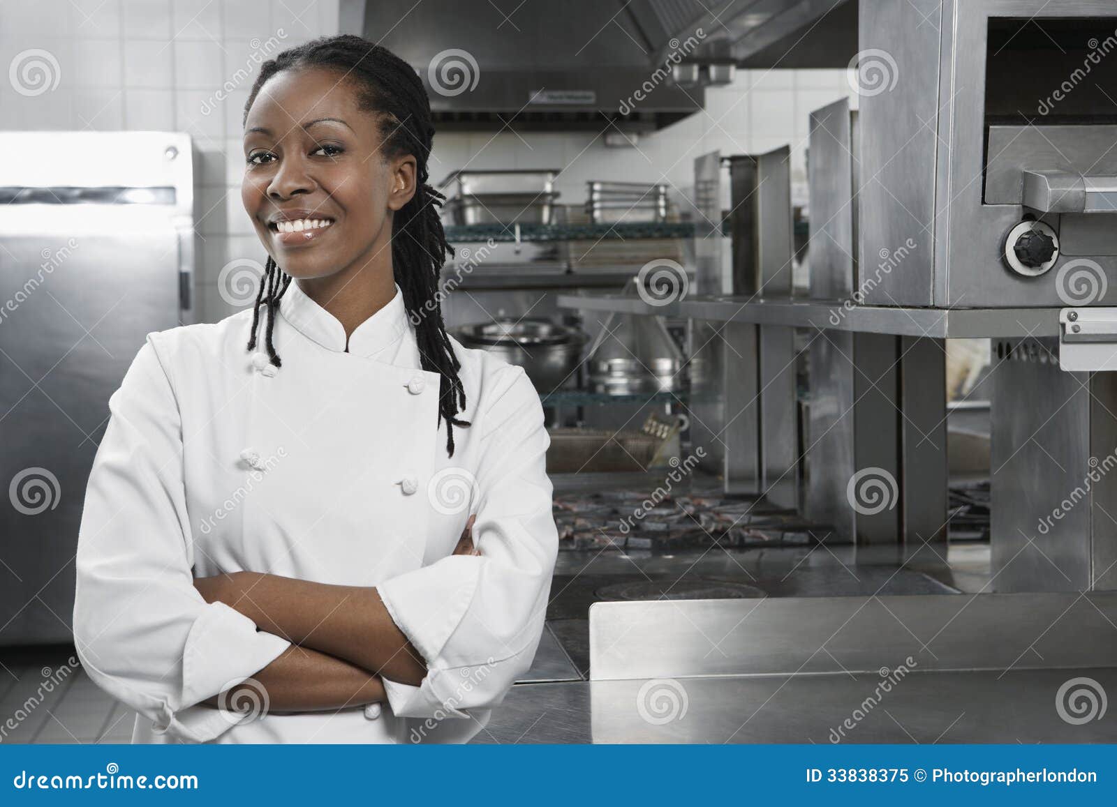 Female Chef in the Kitchen stock image. Image of confident - 33838375