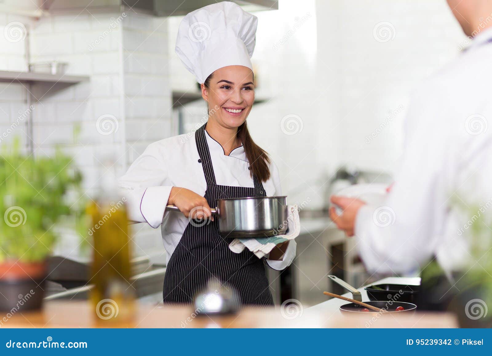 Female chef in kitchen stock photo. Image of professional - 95239342