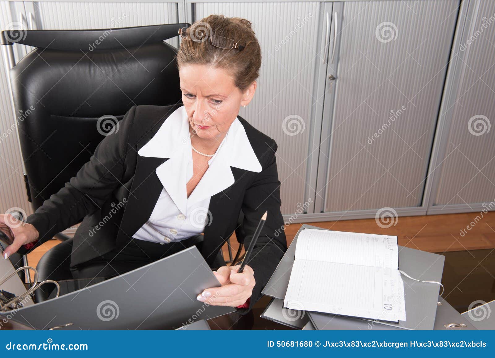 Female Chef in the Office with a Lot of Files Stock Photo - Image of ...