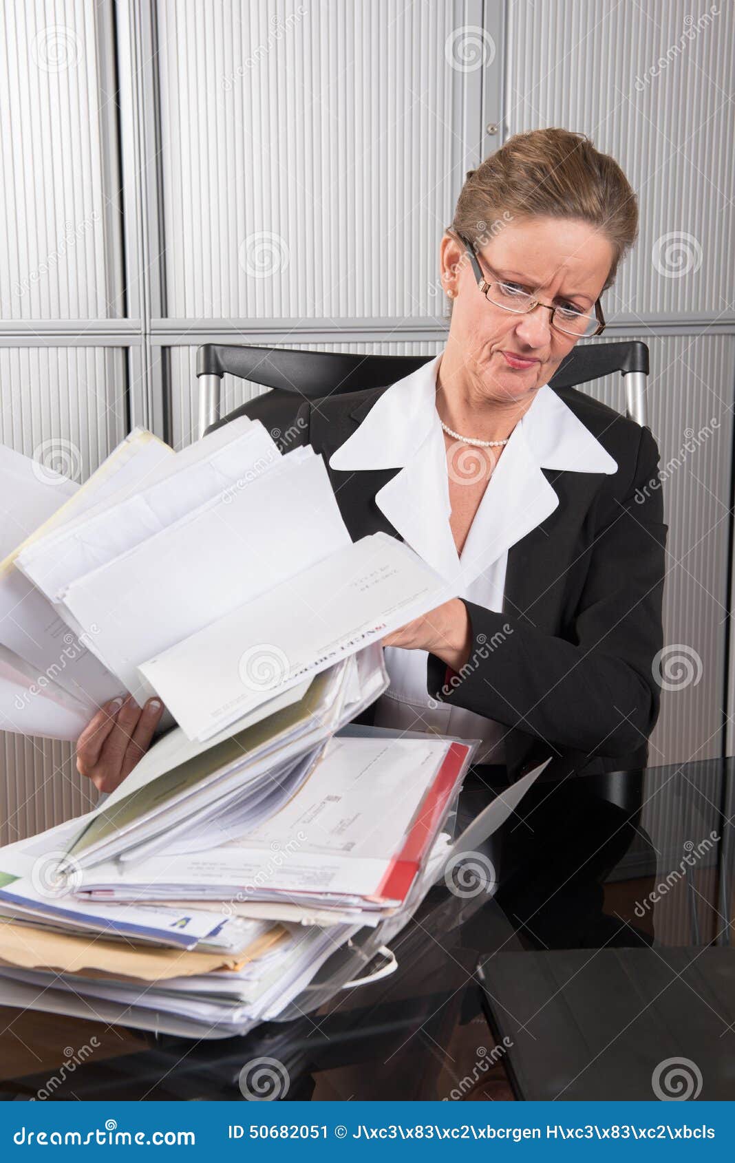 Female Chef in the Office with a Lot of Papers Stock Image - Image of ...