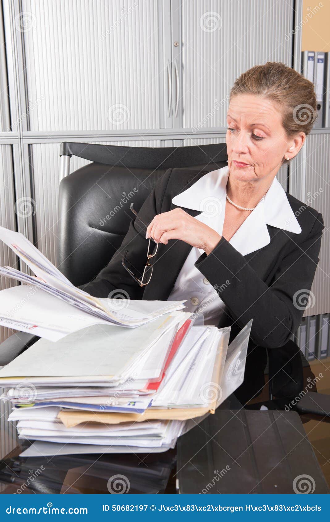 Female Chef in the Office with a Lot of Papers Stock Image - Image of ...