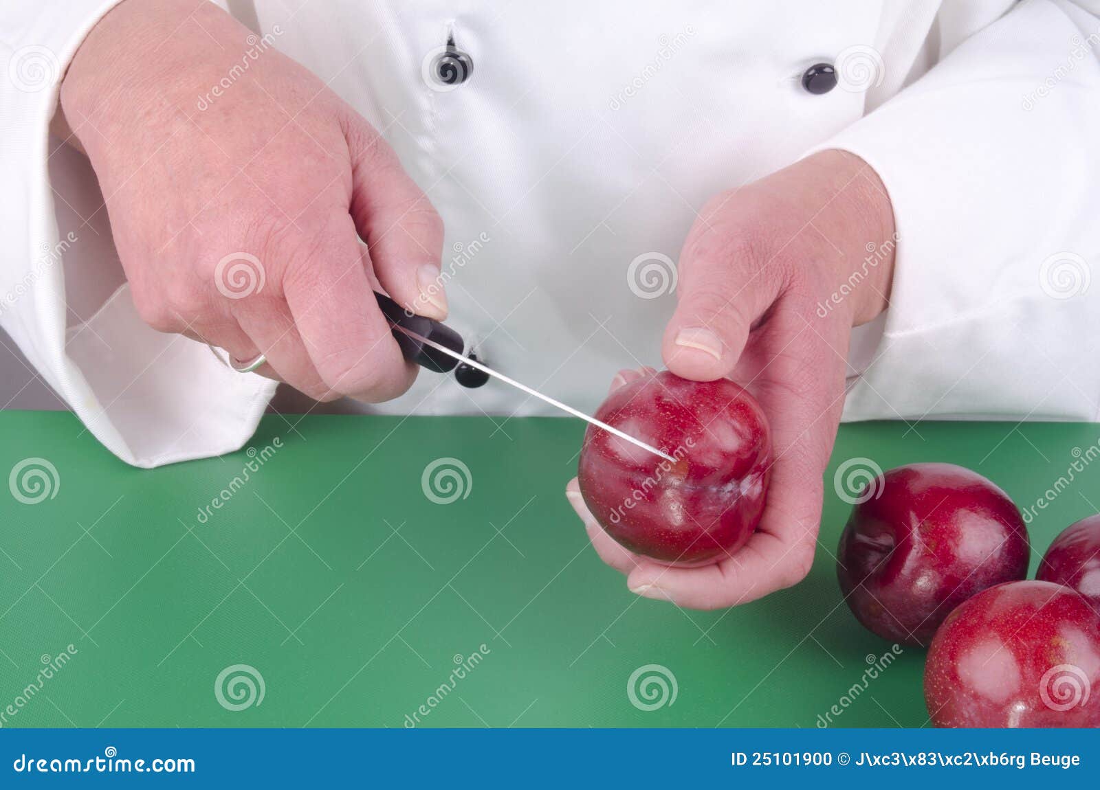 Female Chef Preparing a Plum Stock Photo - Image of green, board: 25101900