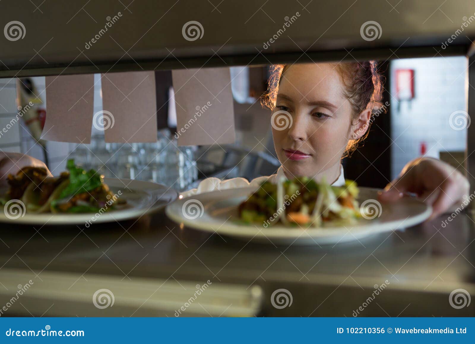 Female chef reading order stock photo. Image of chefs - 102210356