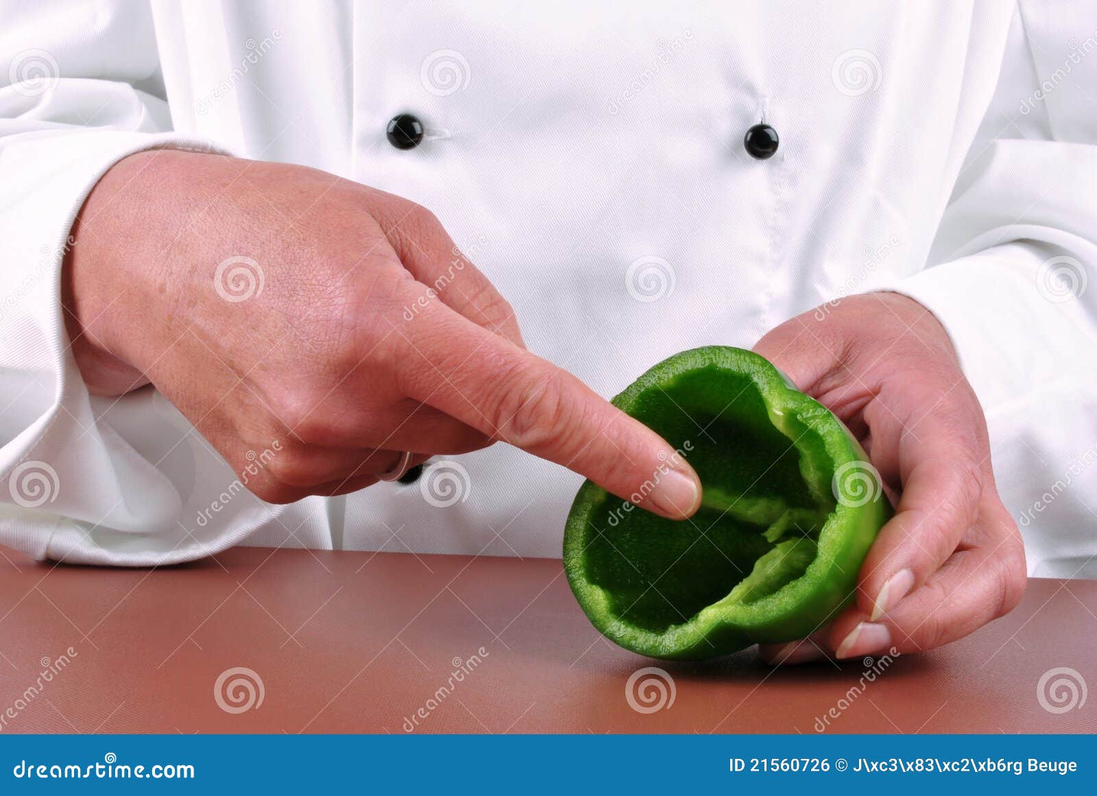 Female Chef Shows with Her Index Finger Stock Photo - Image of brown ...