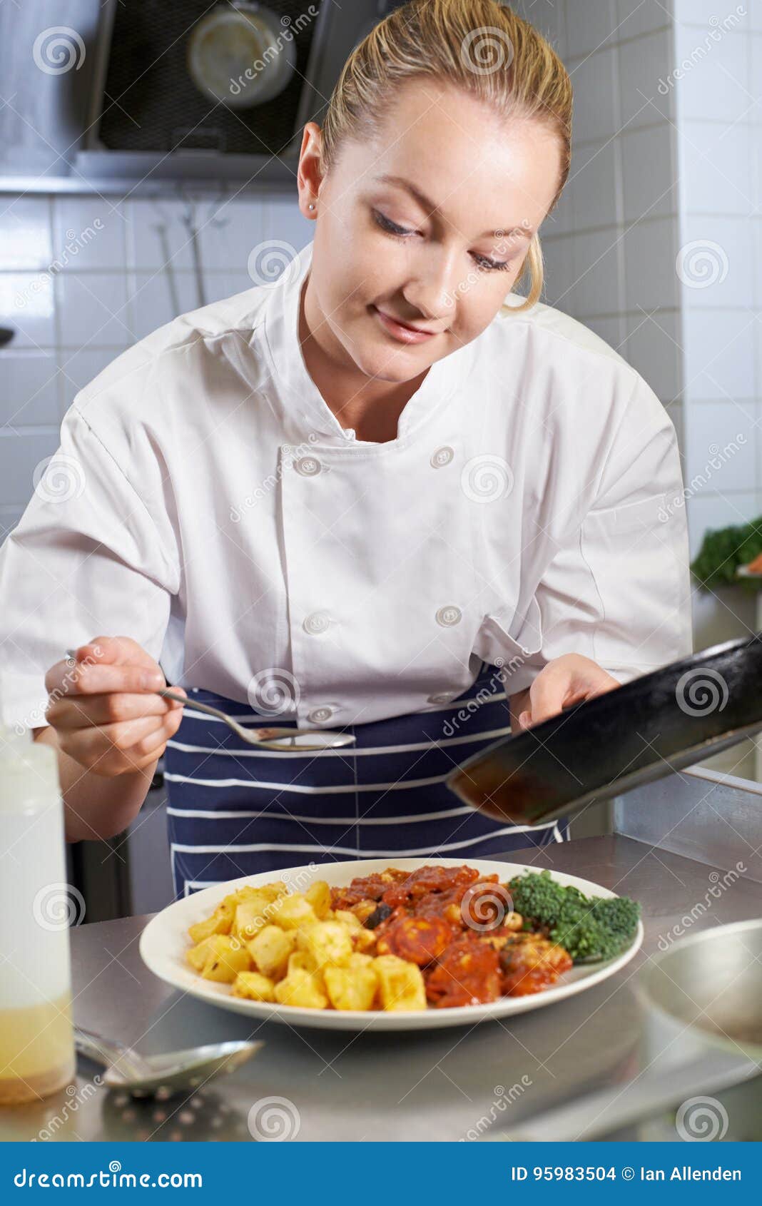 Female Chef Working in Restaurant Kitchen Stock Photo - Image of ...