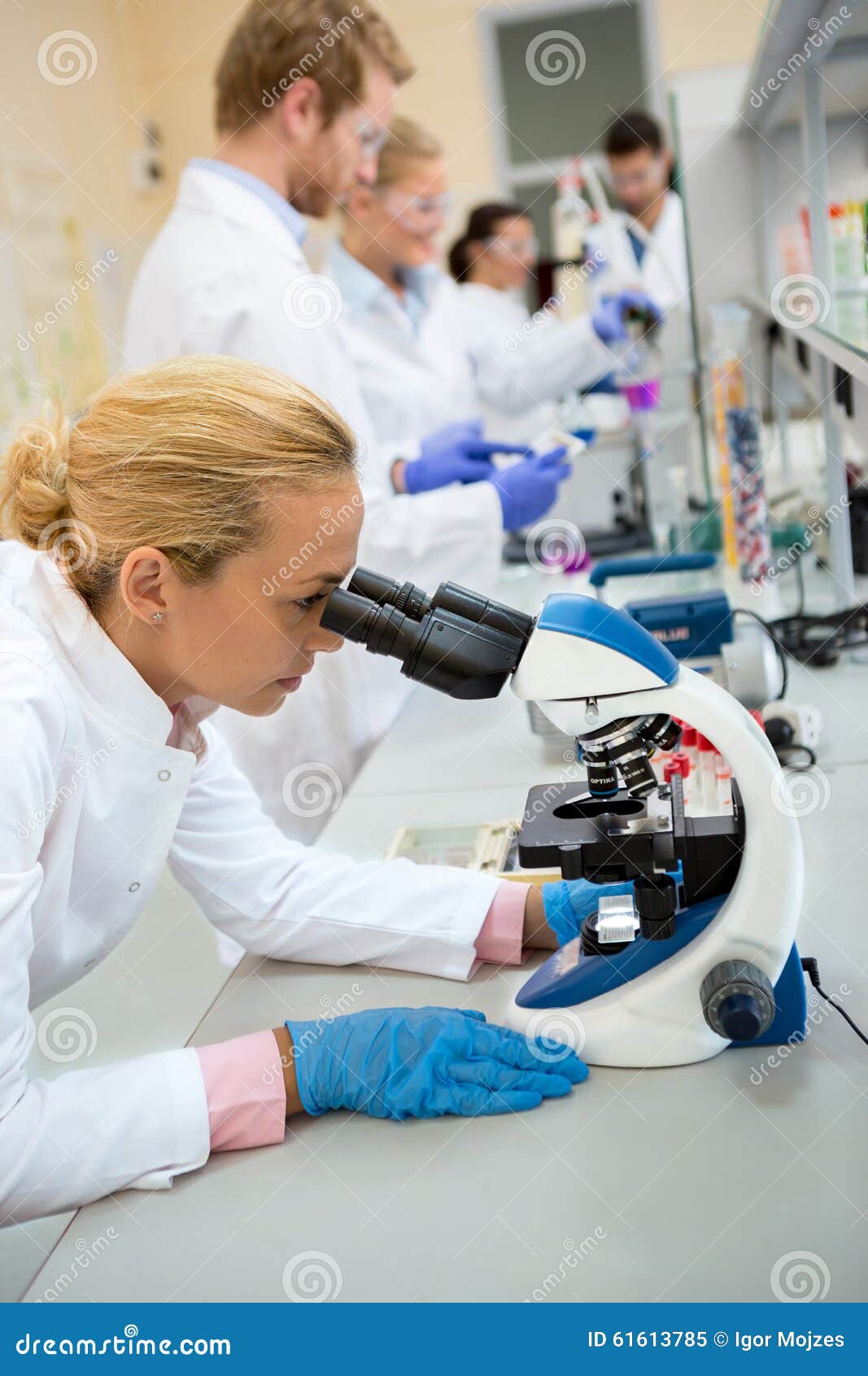 Female Chemical Works with Microscope Stock Image - Image of atom ...