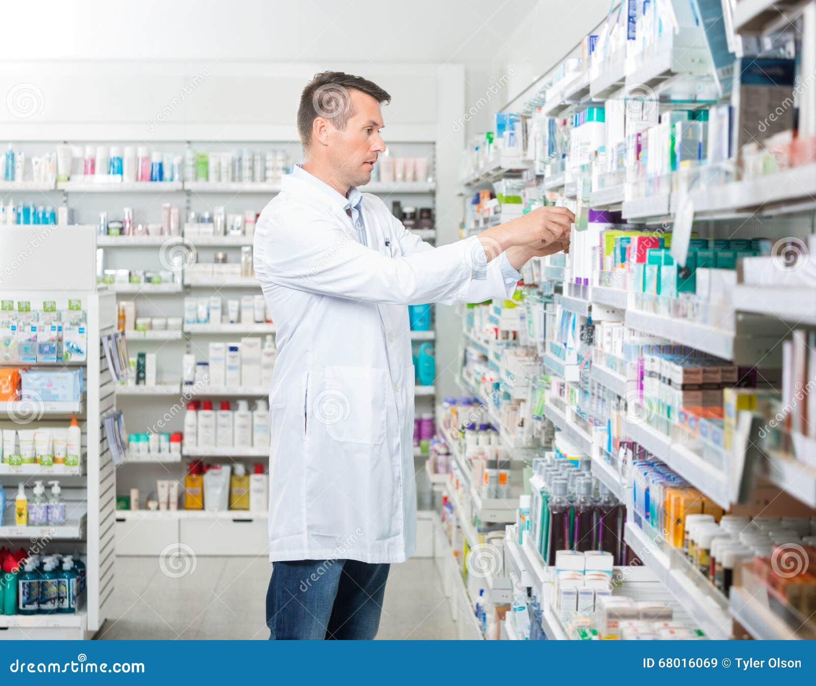 Female Chemist Arranging Products in Pharmacy Stock Image - Image of ...