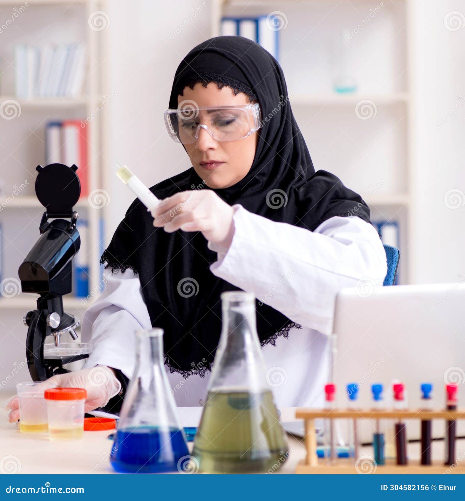 Female Chemist in Hijab Working in the Lab Stock Photo - Image of arab, laboratory: 304582156