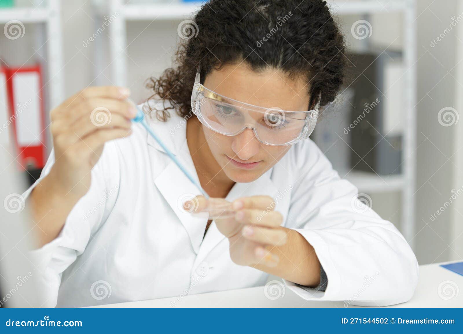 Female Chemist Holding Flask Stock Photo - Image of closeup, flask ...