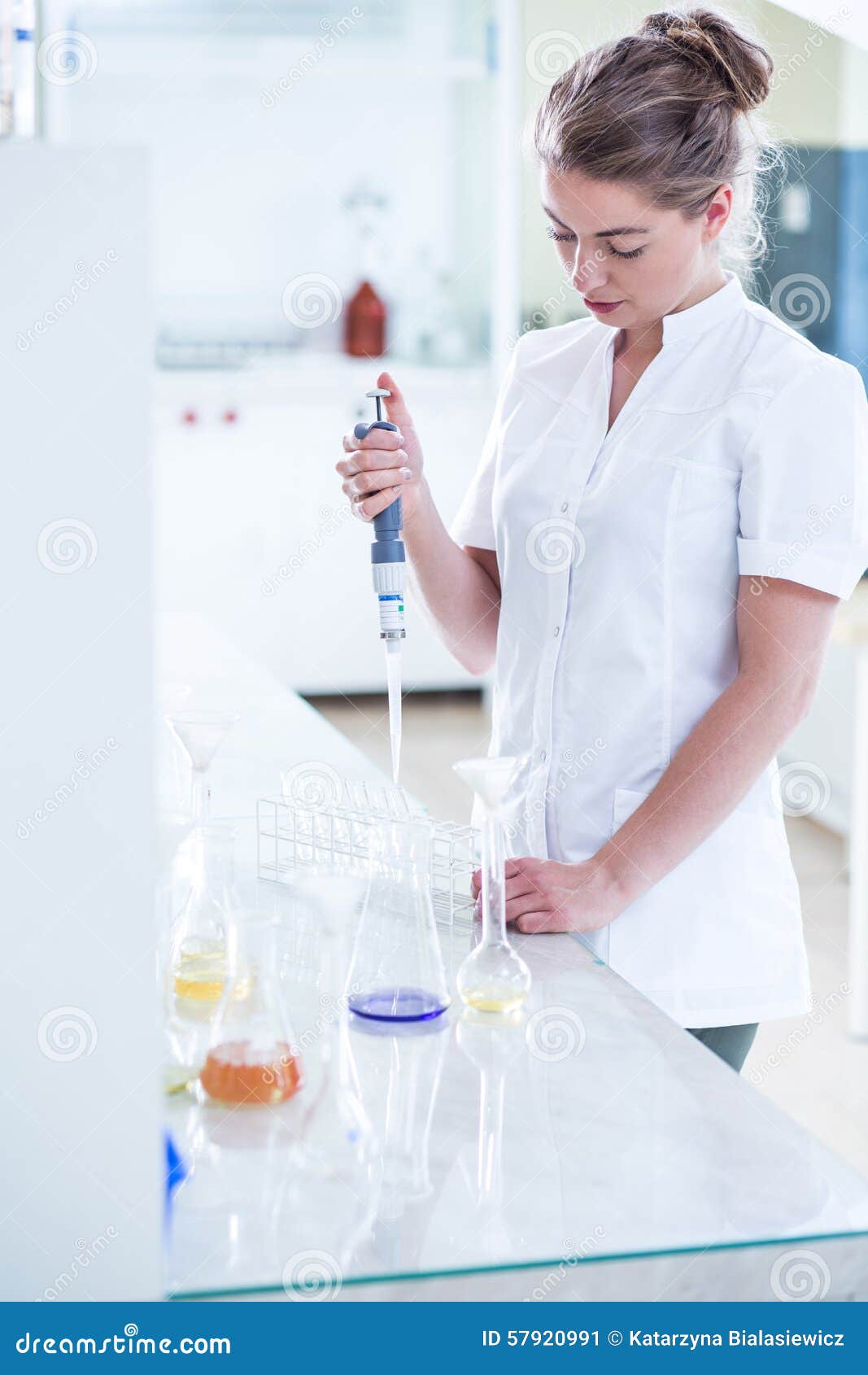 Female Chemist with Pipette Stock Image - Image of drop, biological ...