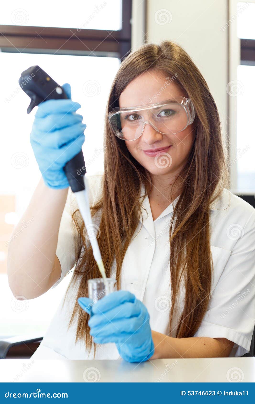 Female Chemist At Work