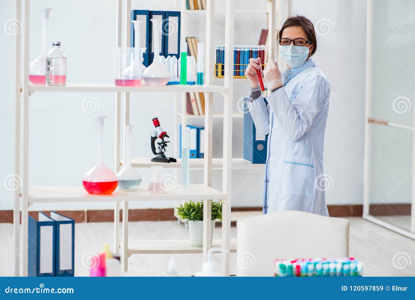 The Female Chemist Working in Hospital Lab Stock Image - Image of ...