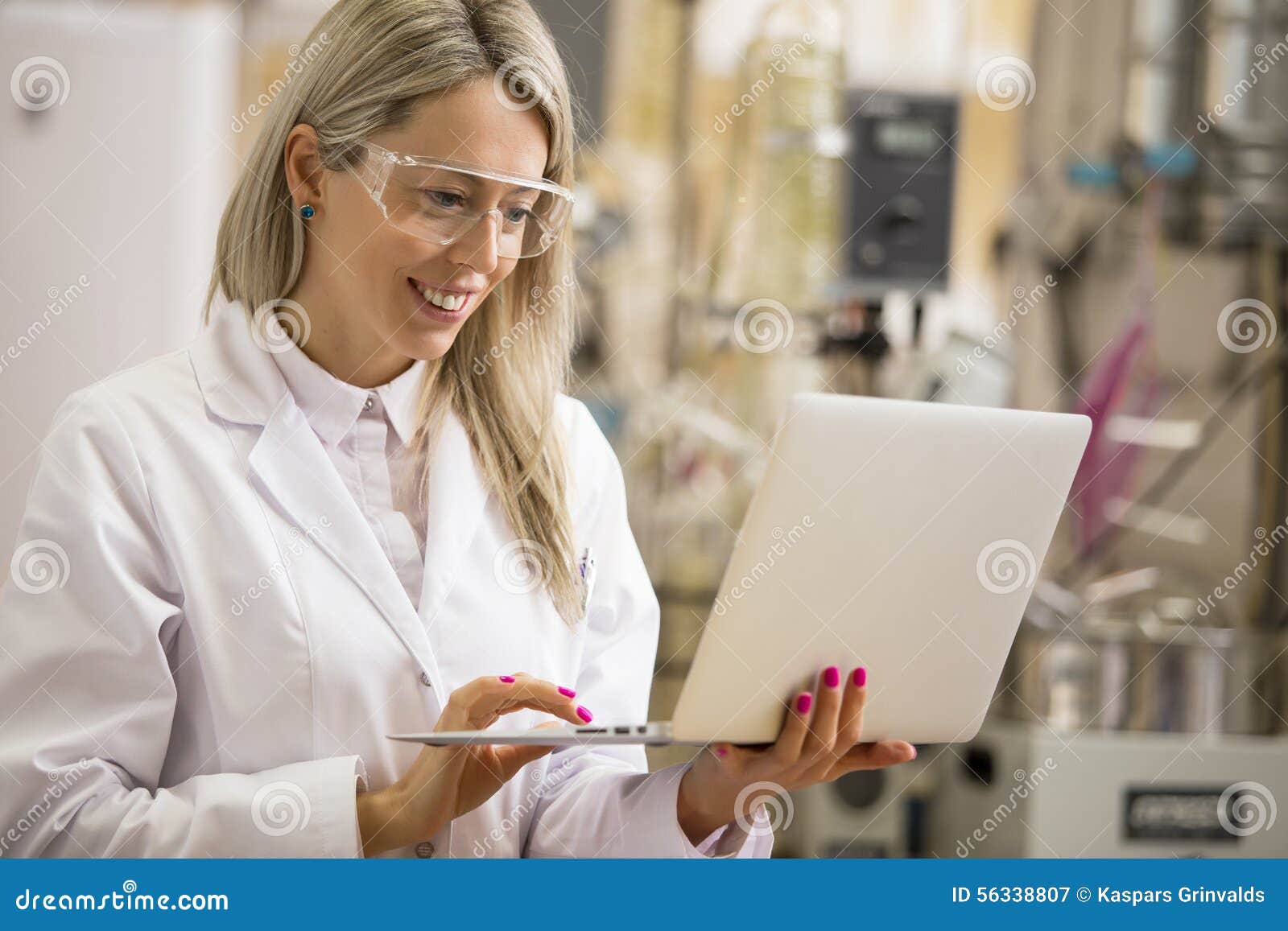 Female Chemist Working with Laptop Computer in the Lab Stock Image ...
