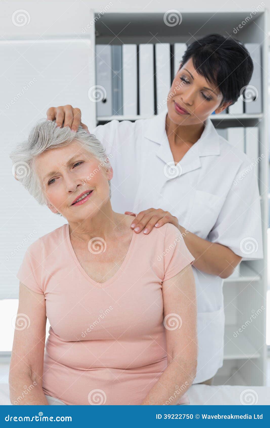 Female Chiropractor Doing Neck Adjustment Stock Photo - Image of ...