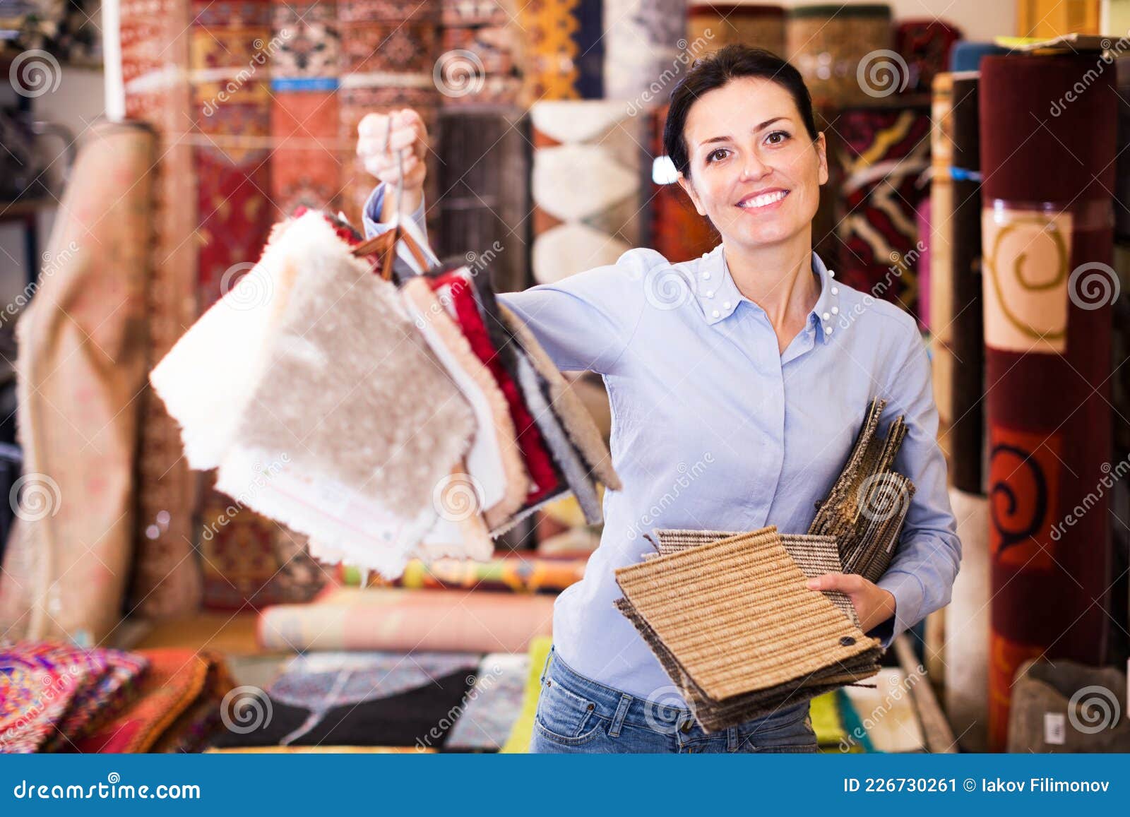 Female Choosing Carpet Samples Stock Image - Image of holding, colorful ...