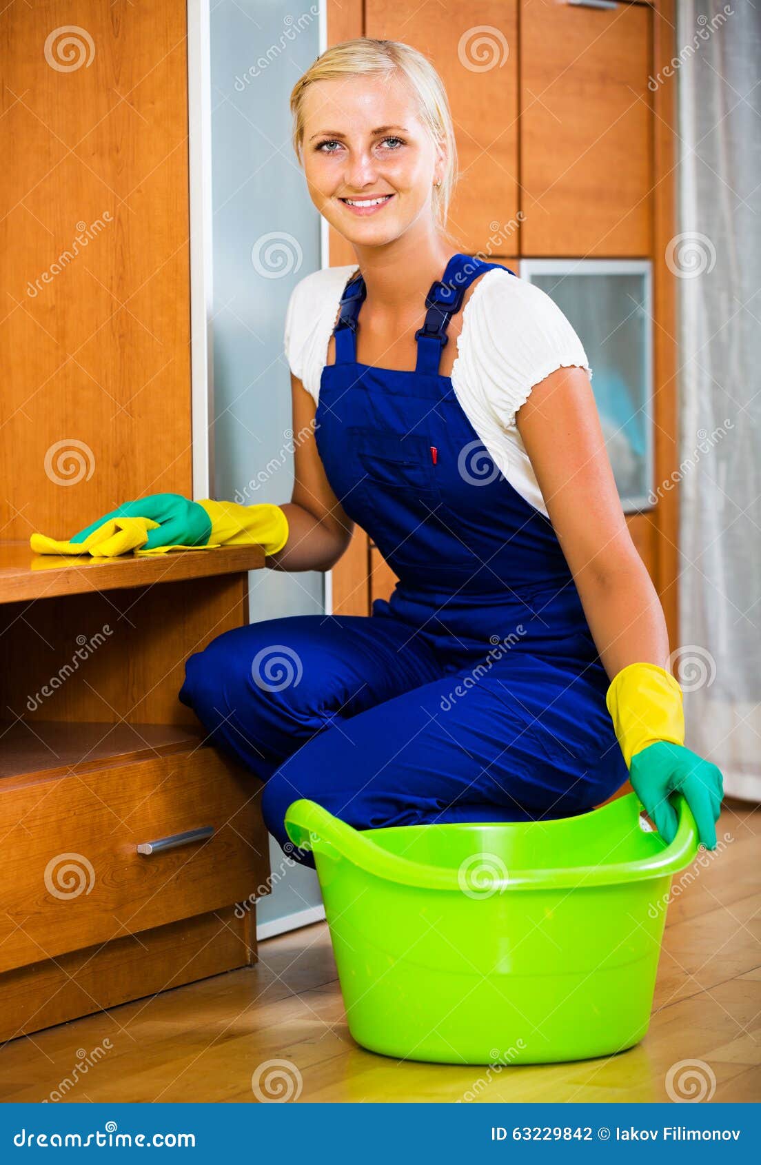 Female Cleaner Doing Regular Clean-up Stock Photo - Image of living ...