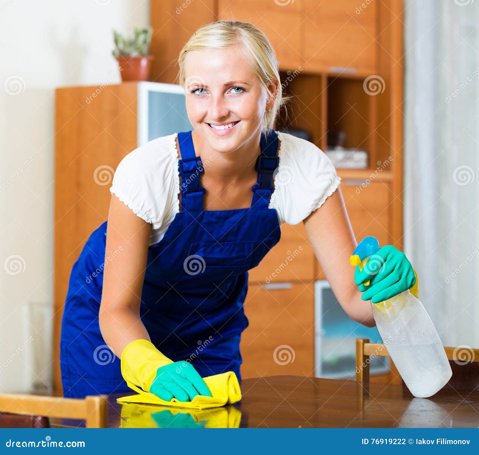 Female Cleaner Doing Regular Clean-up Stock Photo - Image of face ...