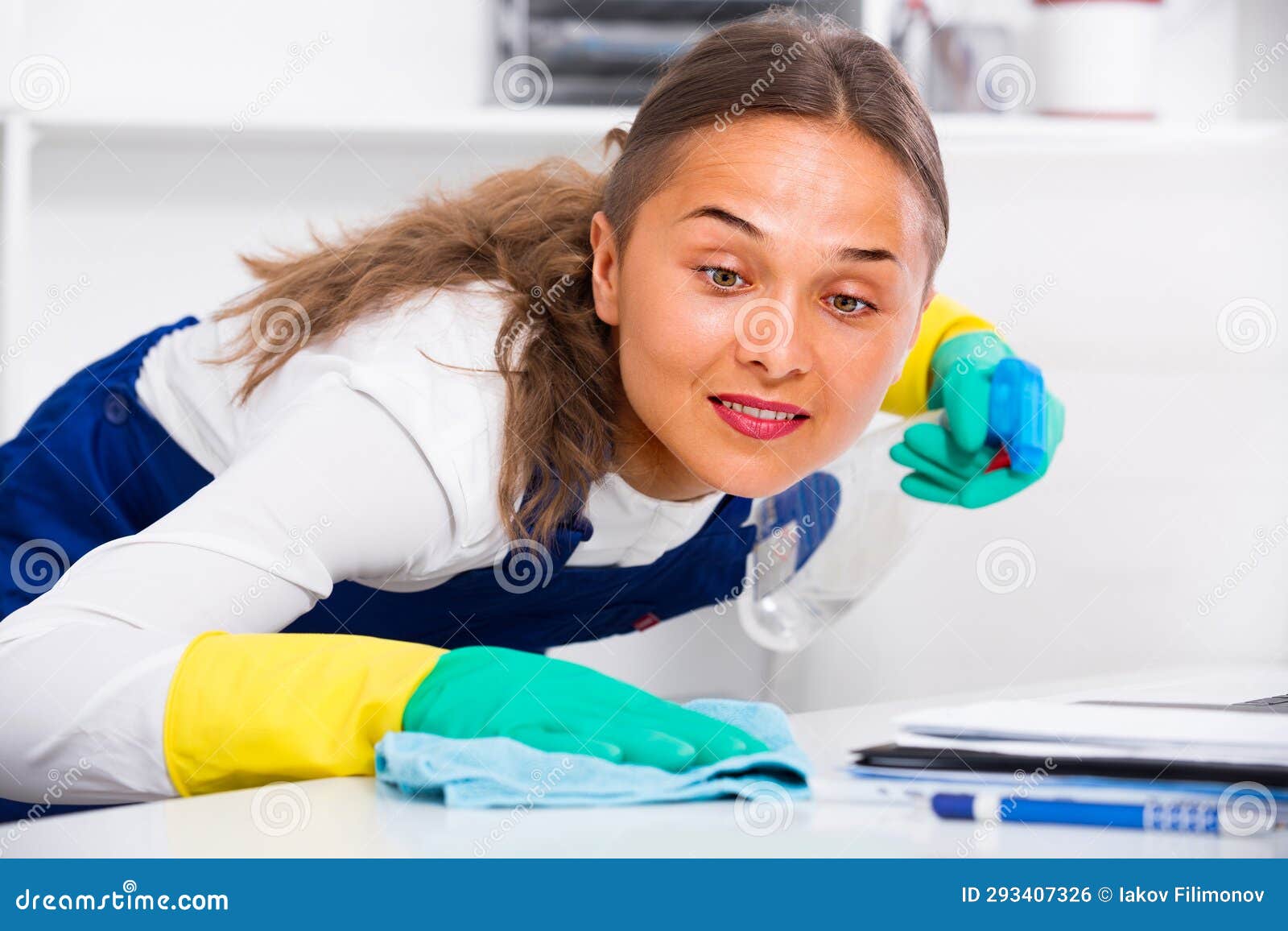 Female cleaner with duster stock photo. Image of detergent - 293407326