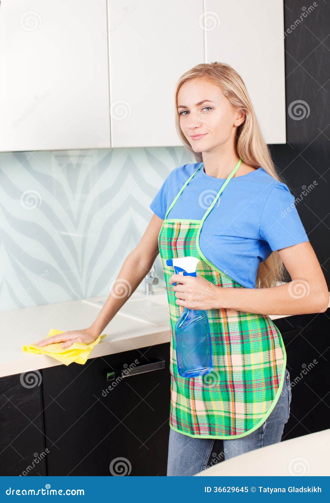 Female cleaning kitchen stock image. Image of cupboard - 36629645