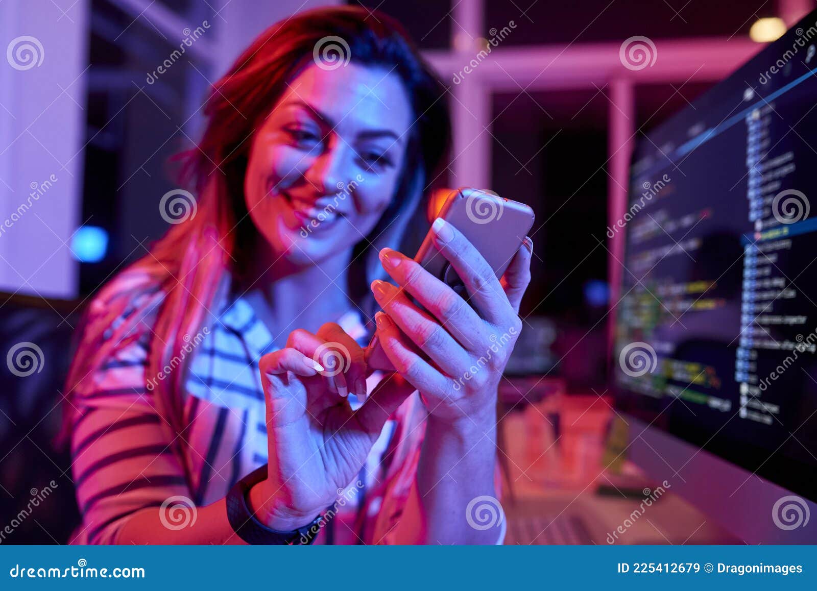 Female Coder Working Late at Night Stock Image - Image of purple, pink ...