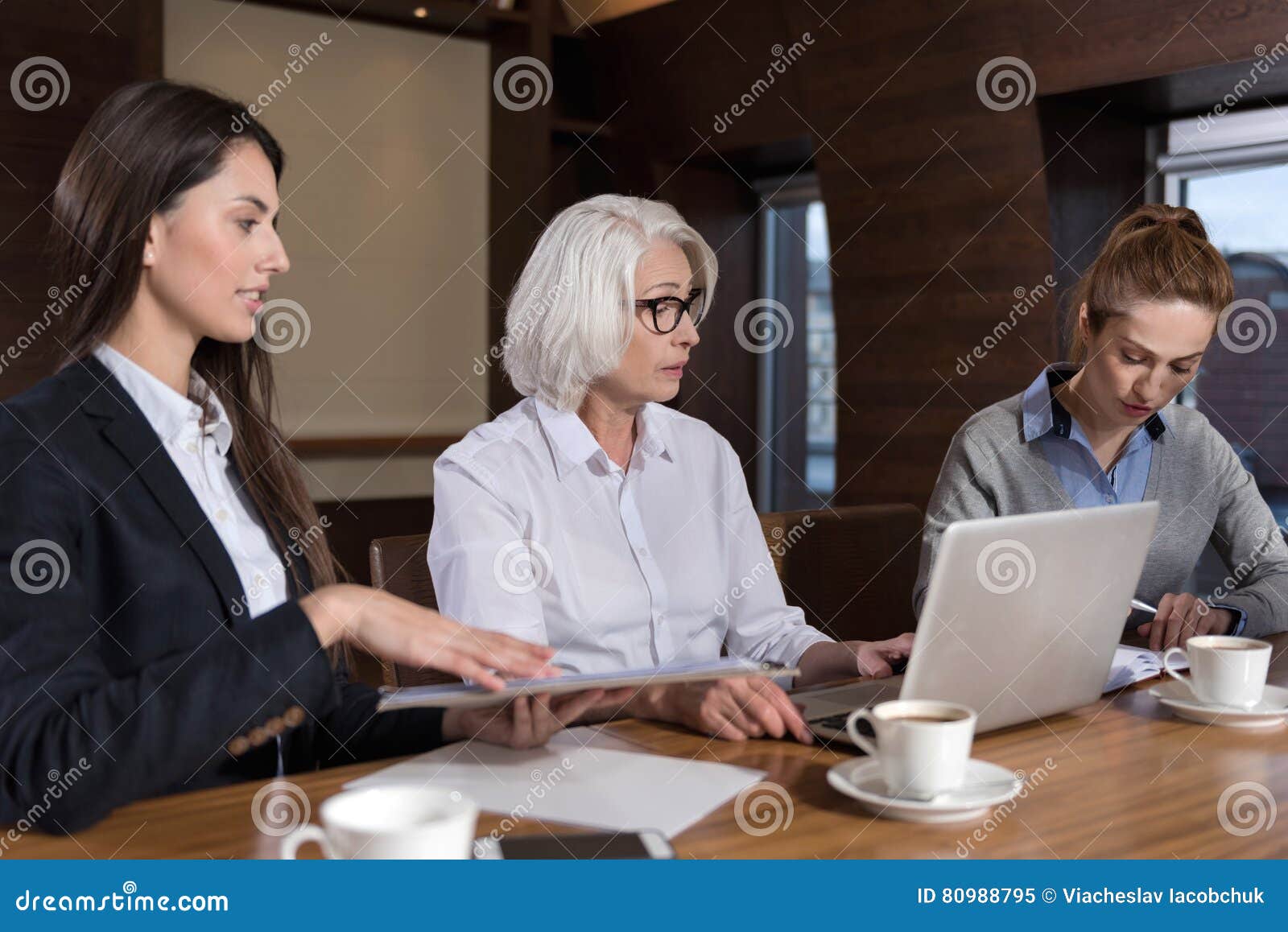 Female Colleagues Enjoying Work Together Stock Image - Image of ...