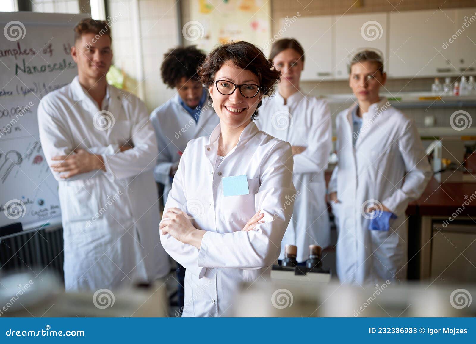 Female With Colleagues In Lab Royalty-Free Stock Photography ...