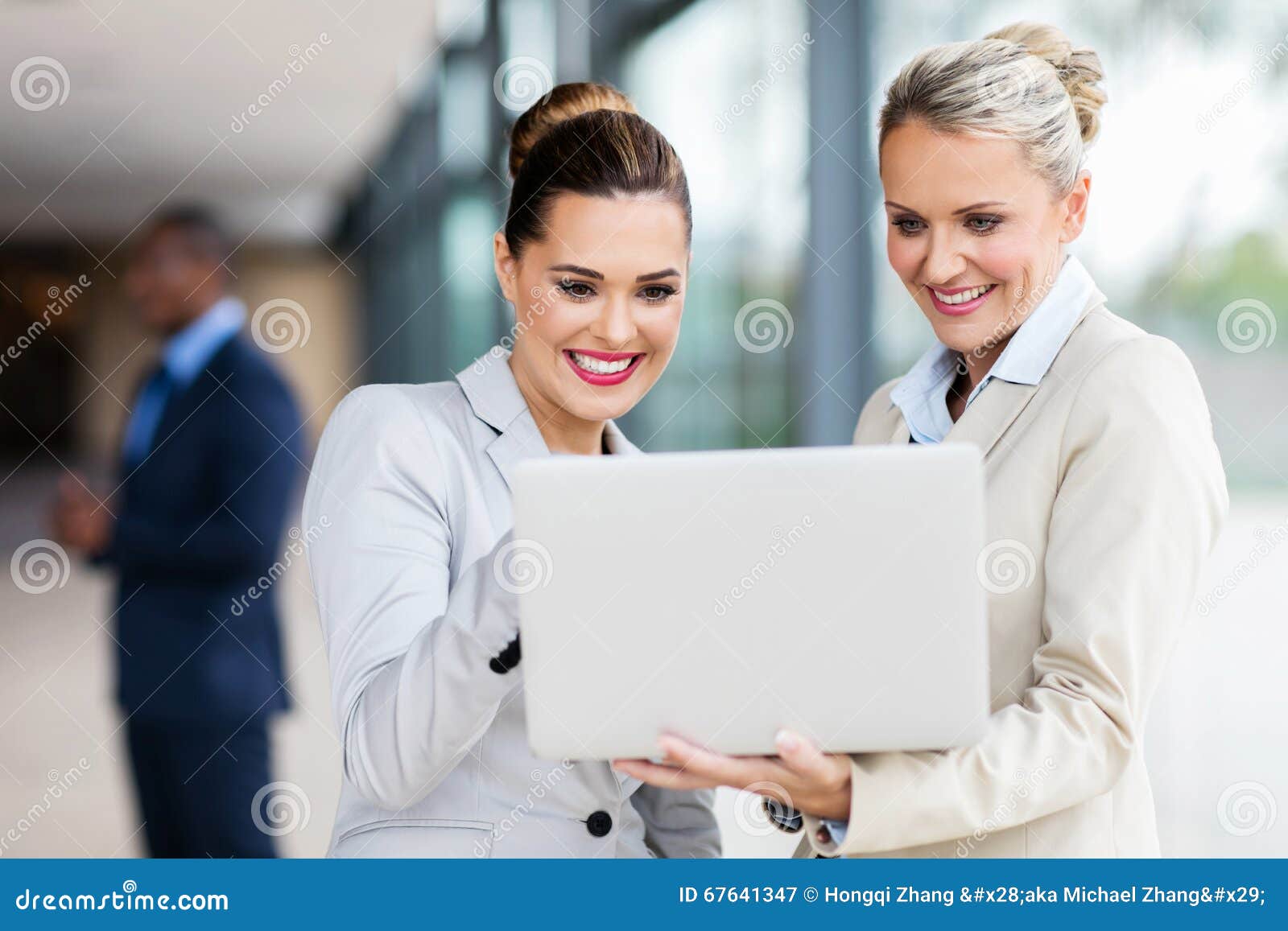 Female Colleagues Laptop Computer Stock Image - Image of middle ...