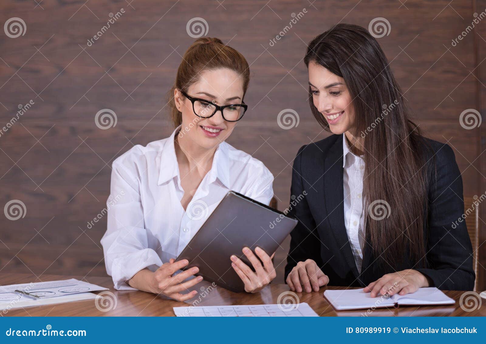 Female Colleagues Sharing Ideas about Work Stock Image - Image of ...