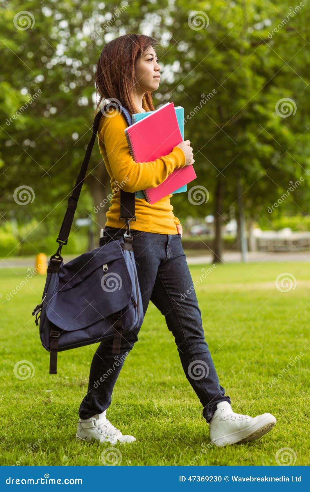 Female College Student with Books Walking in Park Stock Photo - Image ...